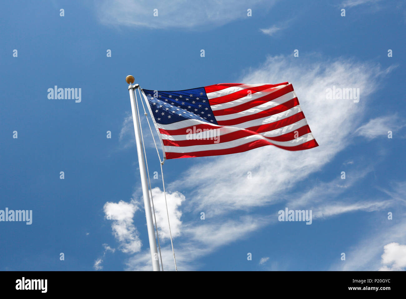 USA. Arizona. US flag floating in the sky Stock Photo - Alamy