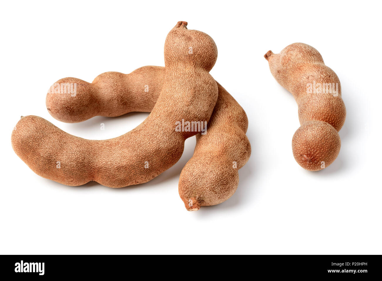 fresh tamarind fruit isolated on white background Stock Photo - Alamy