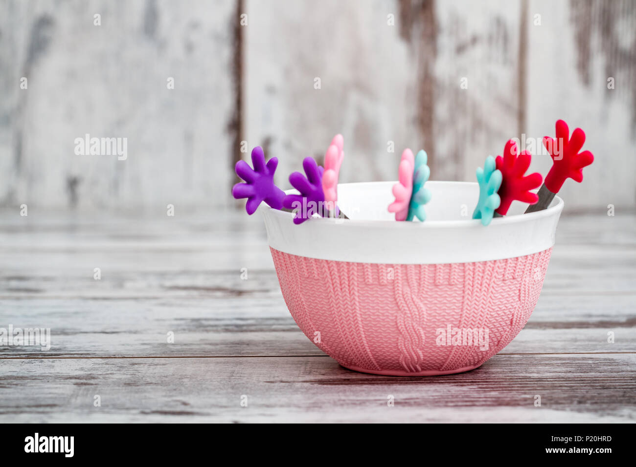 Colorful silicon, metal sugar tongs on white background Stock Photo - Alamy