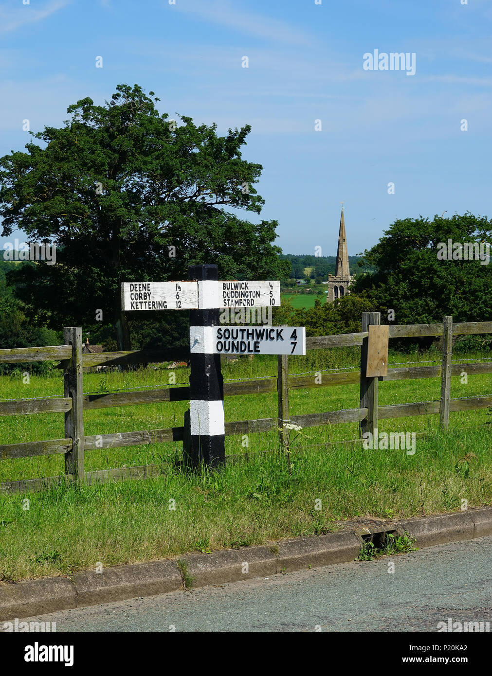 A signpost near Bulwick, Northamptonshire (portrait Stock Photo - Alamy