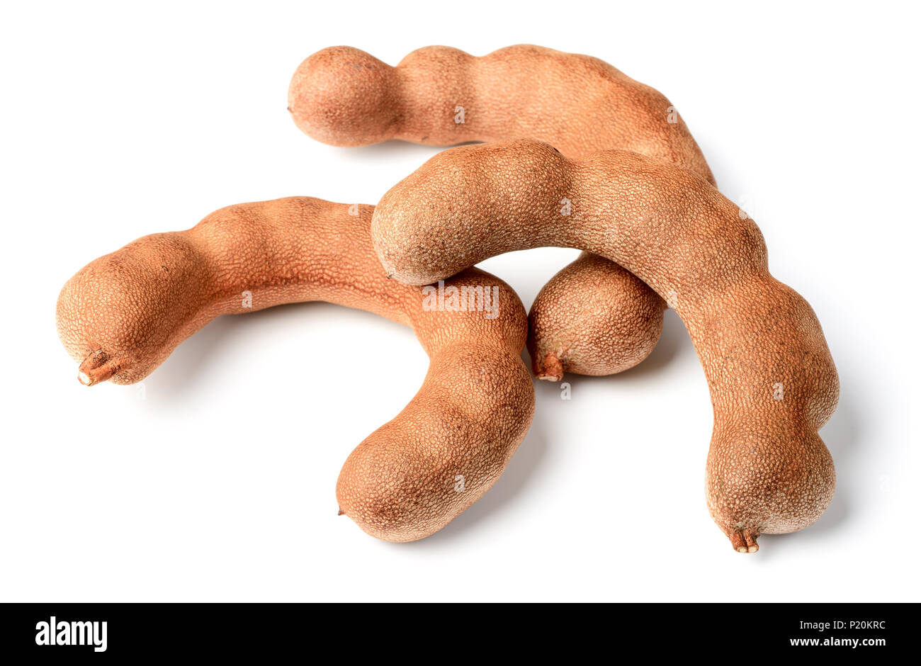 fresh tamarind fruit isolated on white background Stock Photo - Alamy