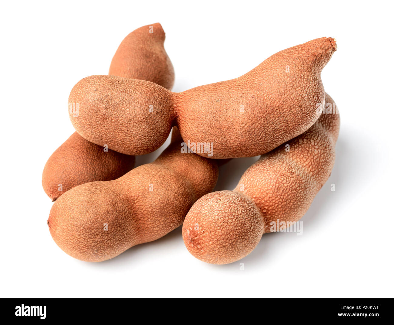 fresh tamarind fruit isolated on white background Stock Photo - Alamy