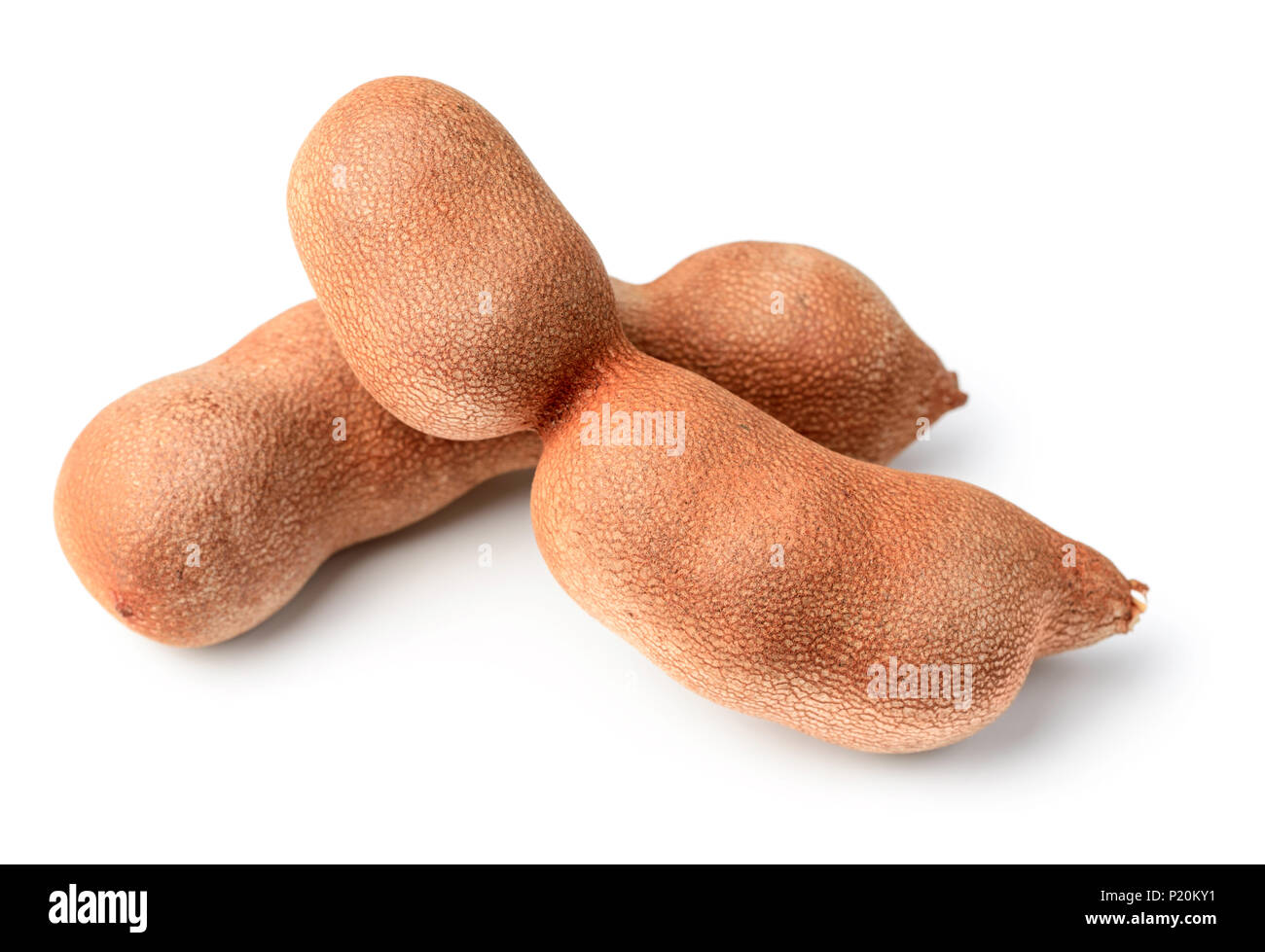 fresh tamarind fruit isolated on white background Stock Photo - Alamy