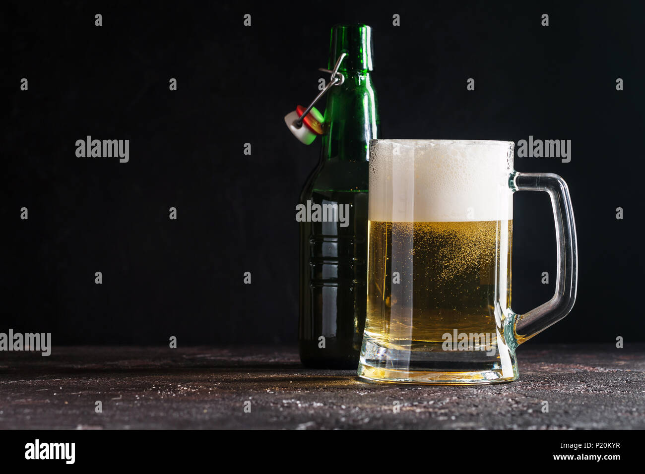 Glass mug of light beer Stock Photo - Alamy