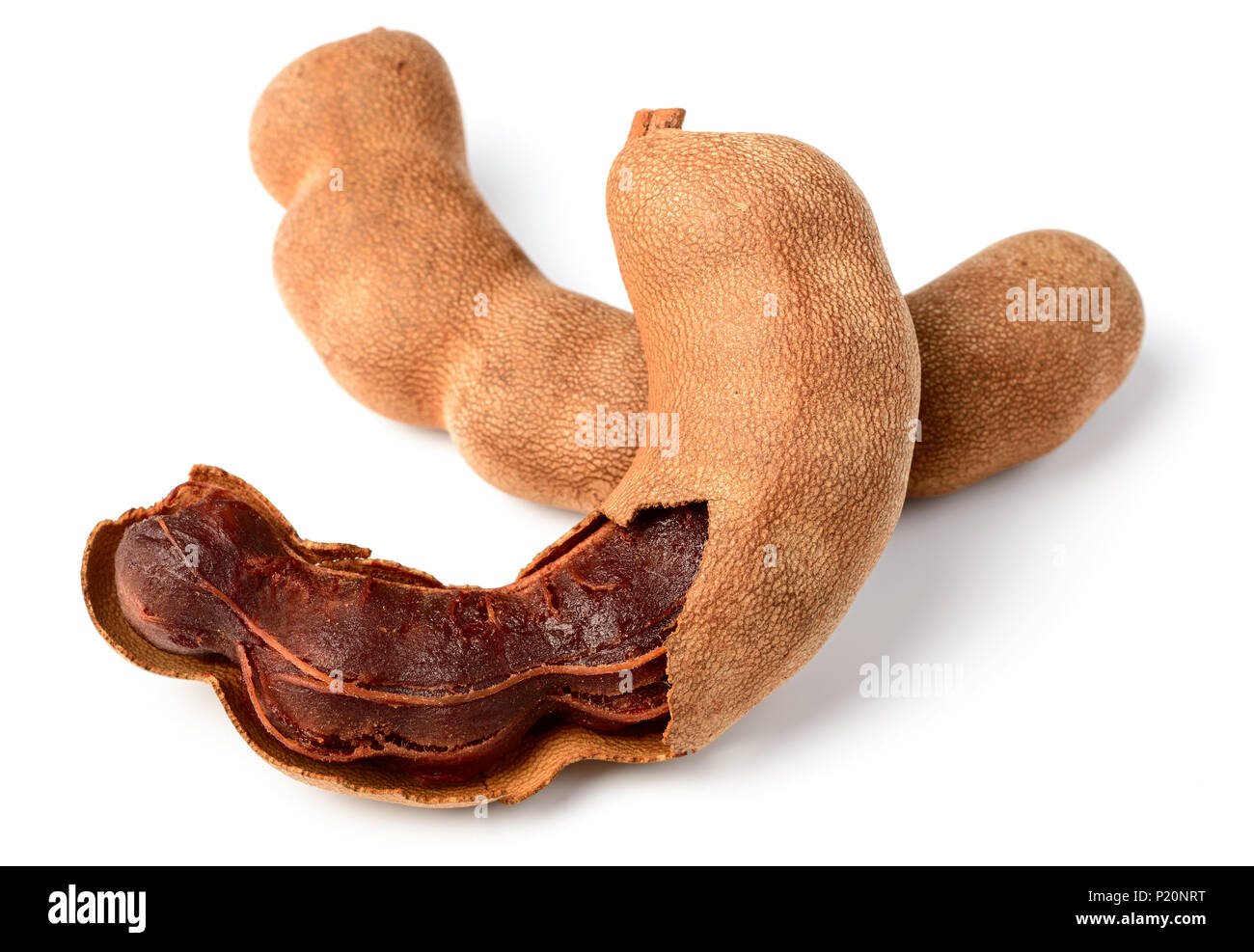 fresh tamarind fruit isolated on white background Stock Photo - Alamy