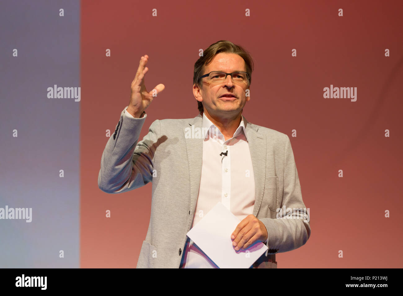 Cologne, Germany, June 13 2018, broadband fair Angacom: Moderator Claus ...