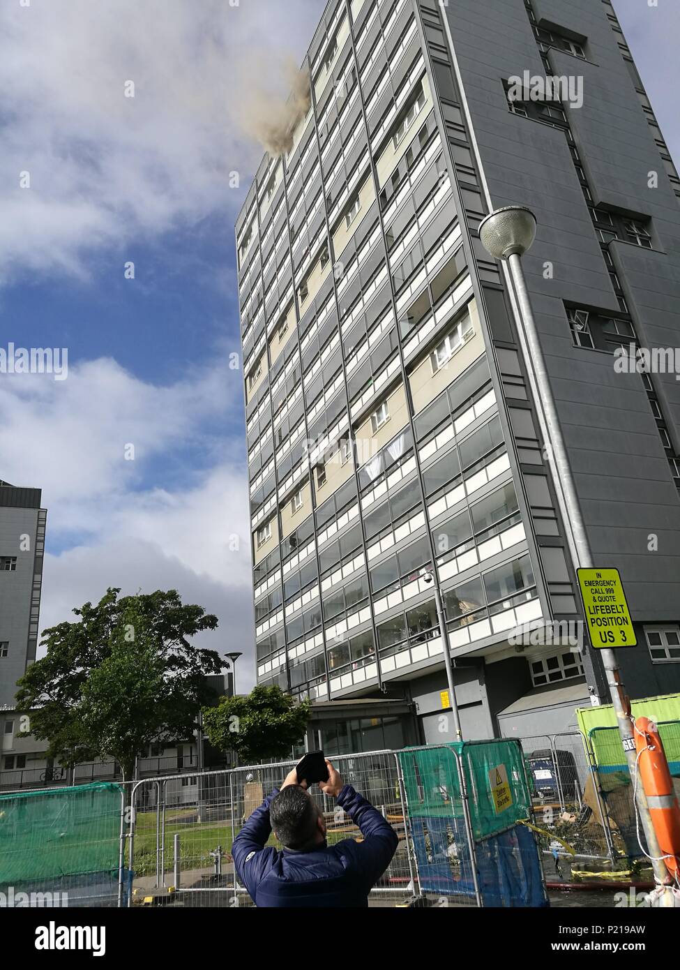 Glasgow, UK. 14th June 2018. Fire at high rise flats on Commercial Road ...