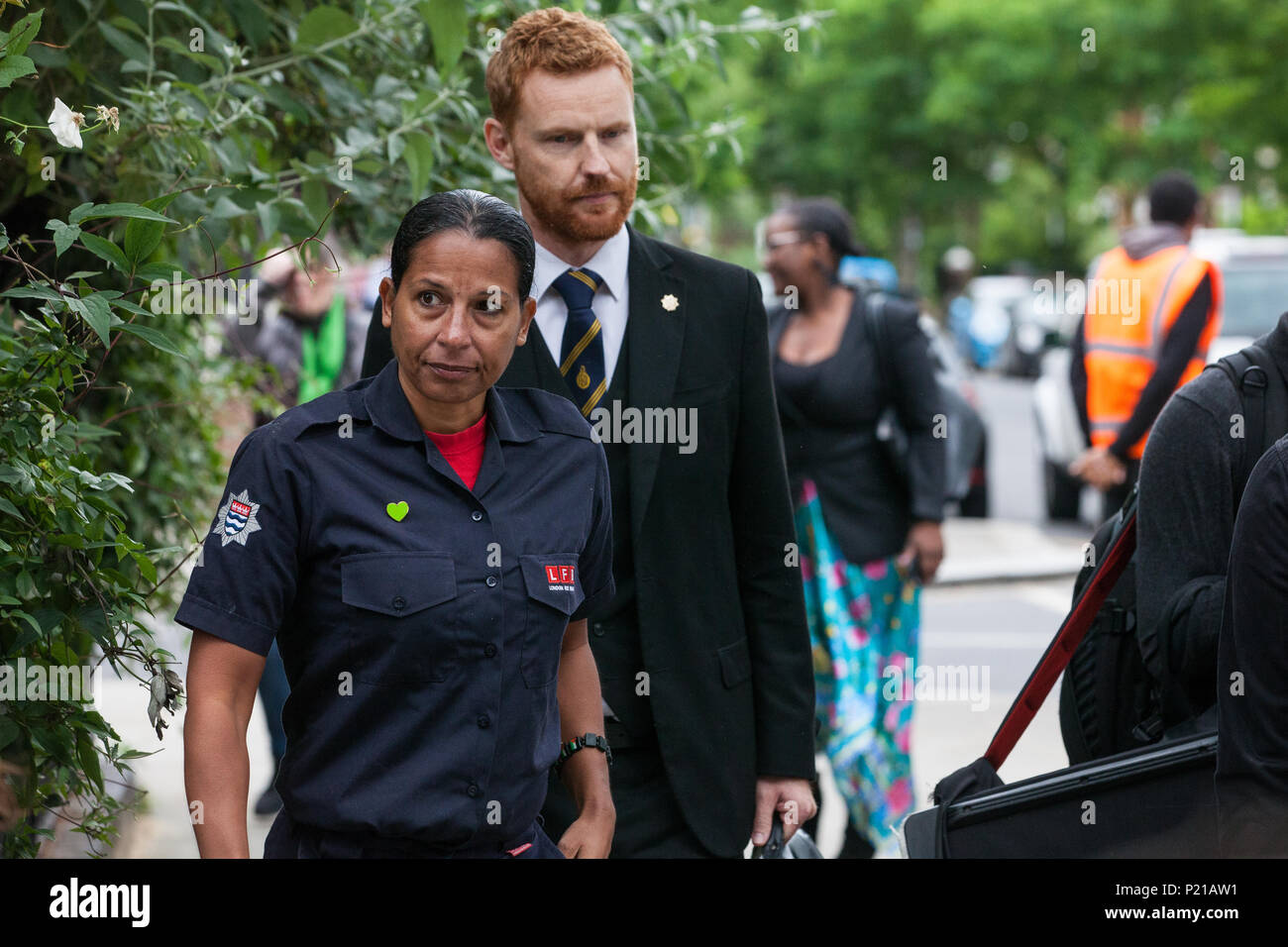 London, UK. 14th June, 2018. Paul Embery and Lucy Masoud of the Fire Brigades Union arrive for ...