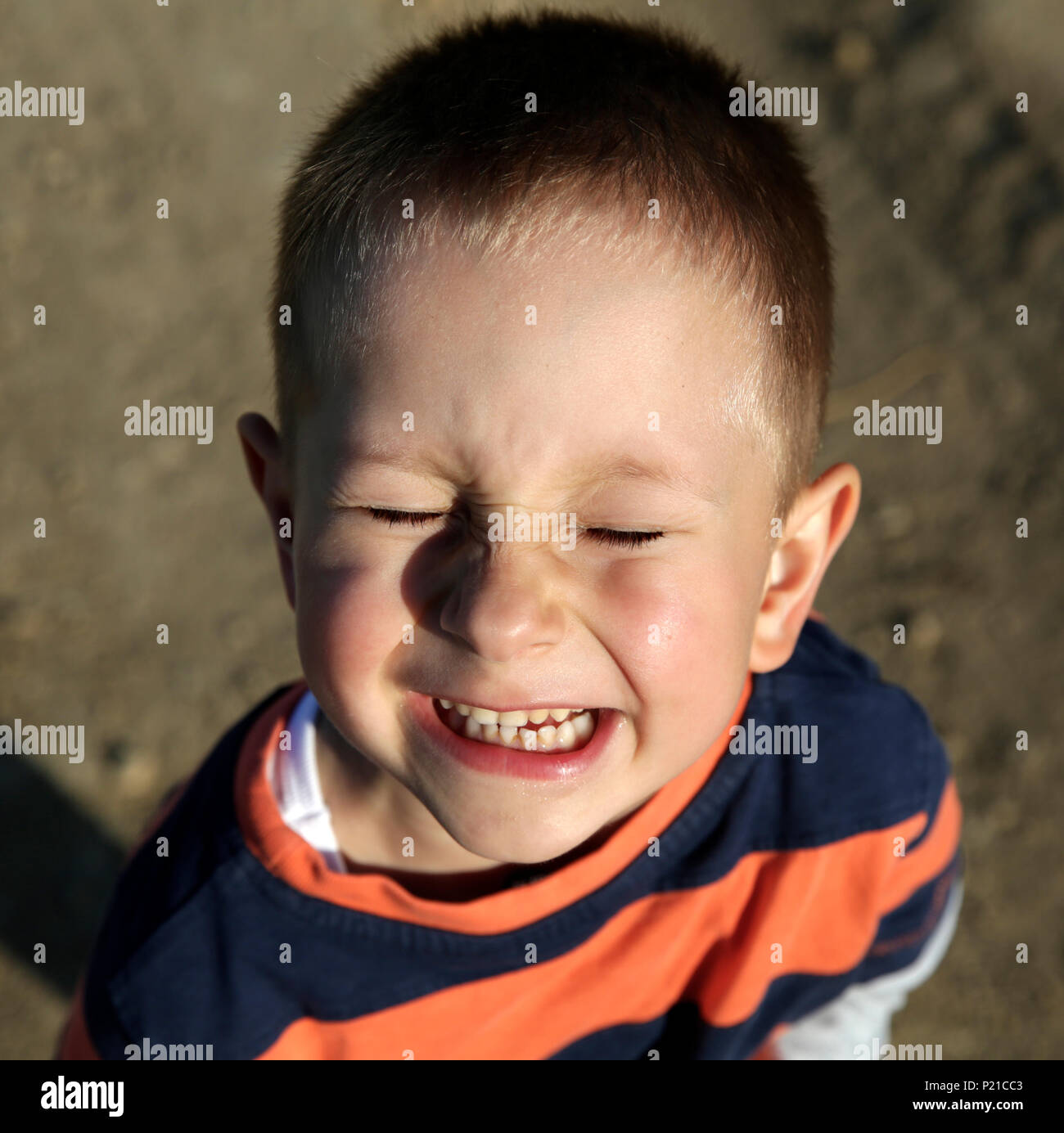 Cute smiling little boy outdoors Stock Photo - Alamy