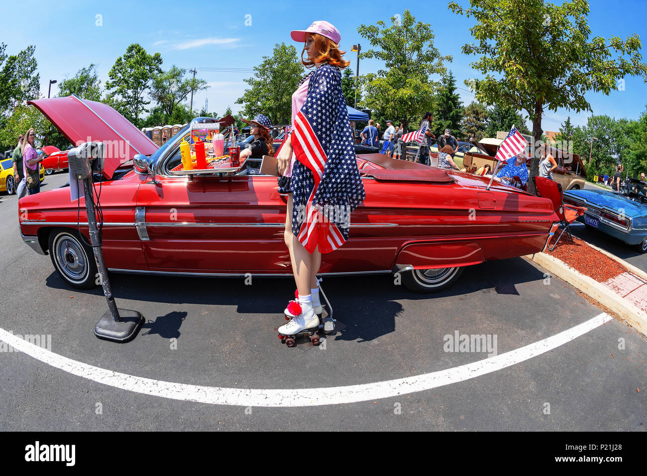 Old American style waitress on roller skates, Antique car show ...