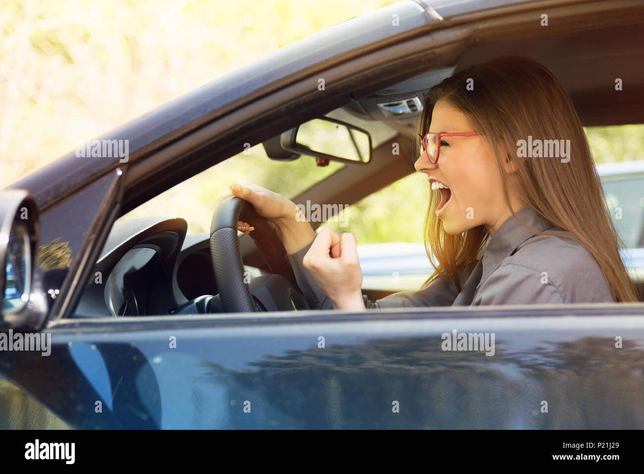 Side profile angry driver. Negative human emotions face expression ...