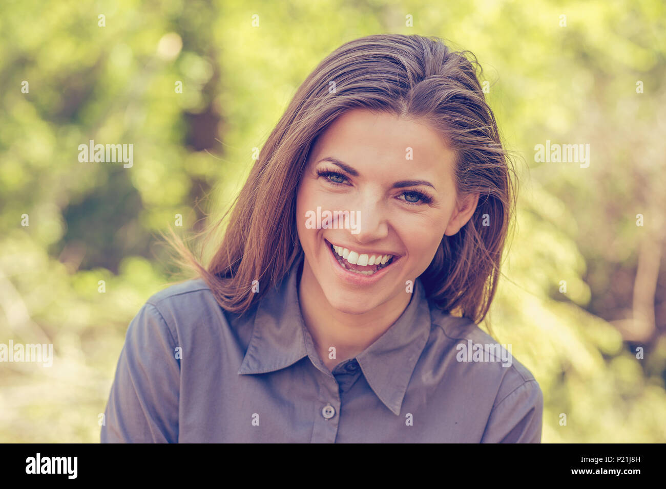 Portrait of a smiling happy woman Stock Photo - Alamy