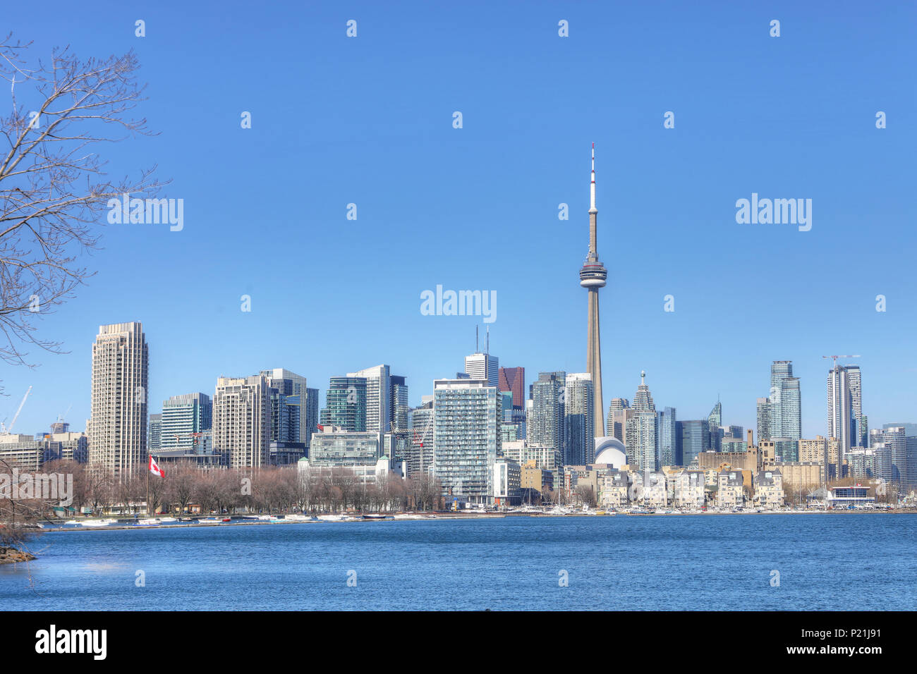 The Toronto skyline across harbor on a sunny day Stock Photo - Alamy