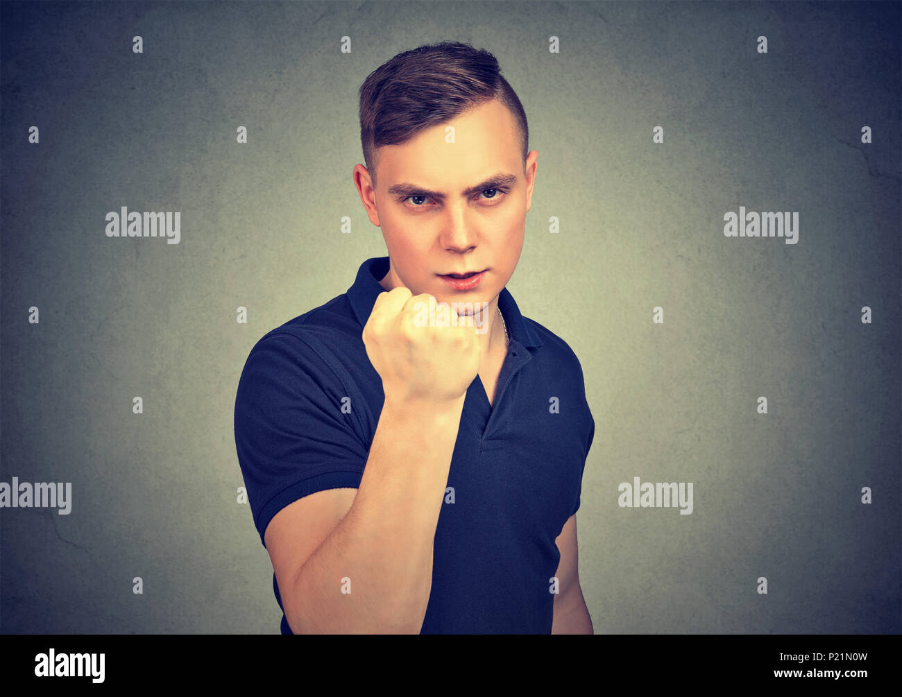 Threatening gesture hi-res stock photography and images - Alamy
