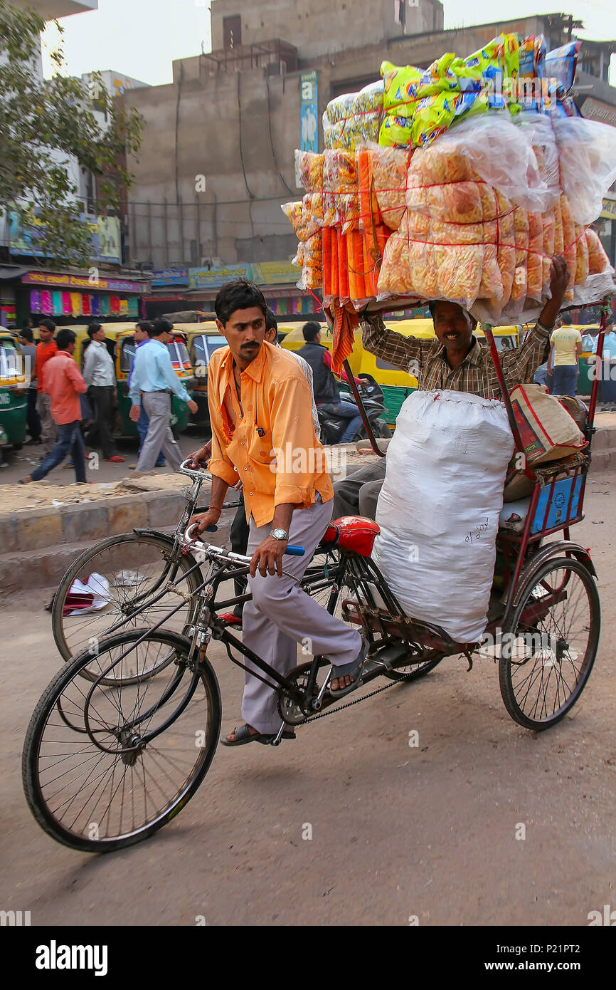 Indian man riding cycle in hi-res stock photography and images - Alamy
