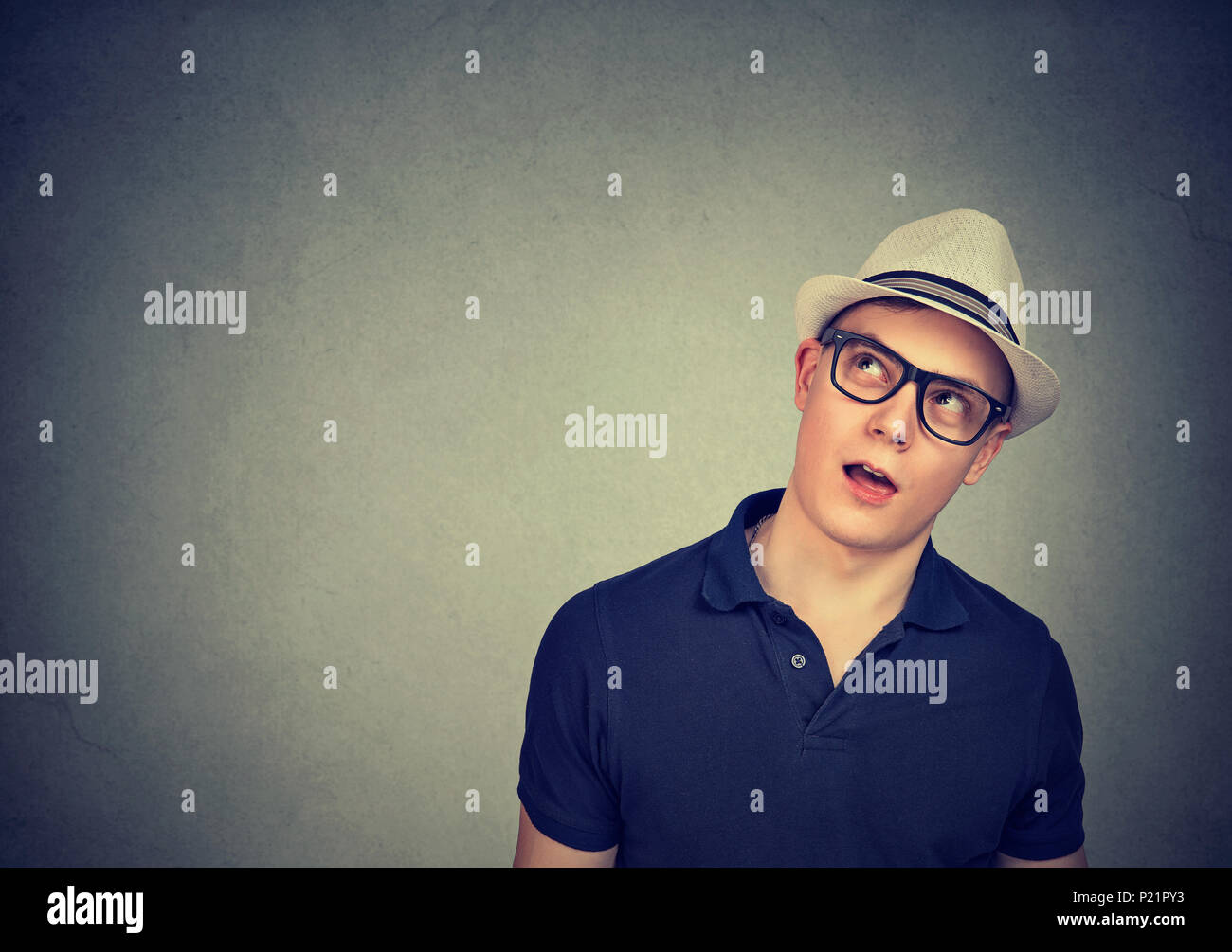 Problems. Confused thoughtful man making a choice Stock Photo - Alamy