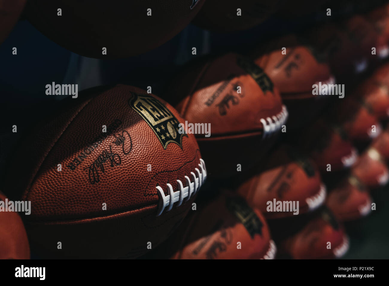Rows of american football balls in NFL Experience in Times Square, New ...