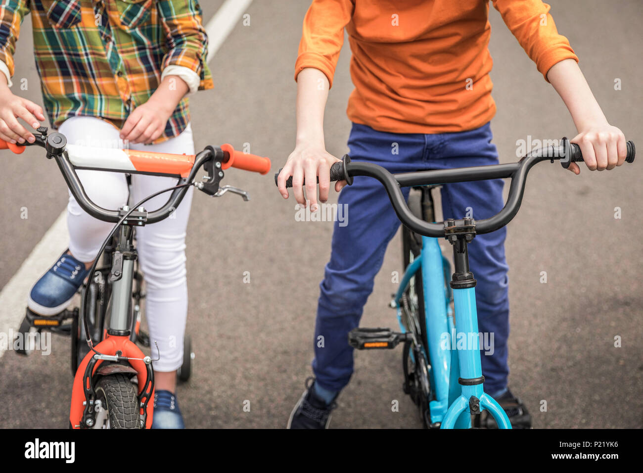Kids with bicycles hi-res stock photography and images - Alamy
