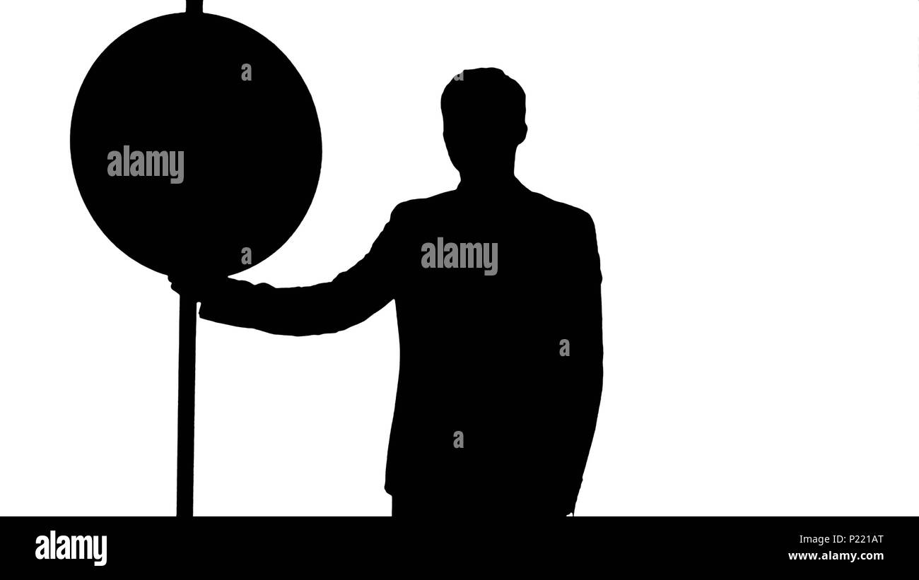 Silhouette Man cross walk sign Stock Photo - Alamy