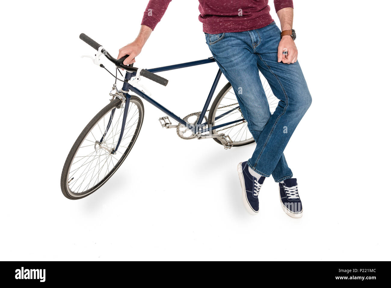 partial view of man leaning on bicycle isolated on white Stock Photo ...