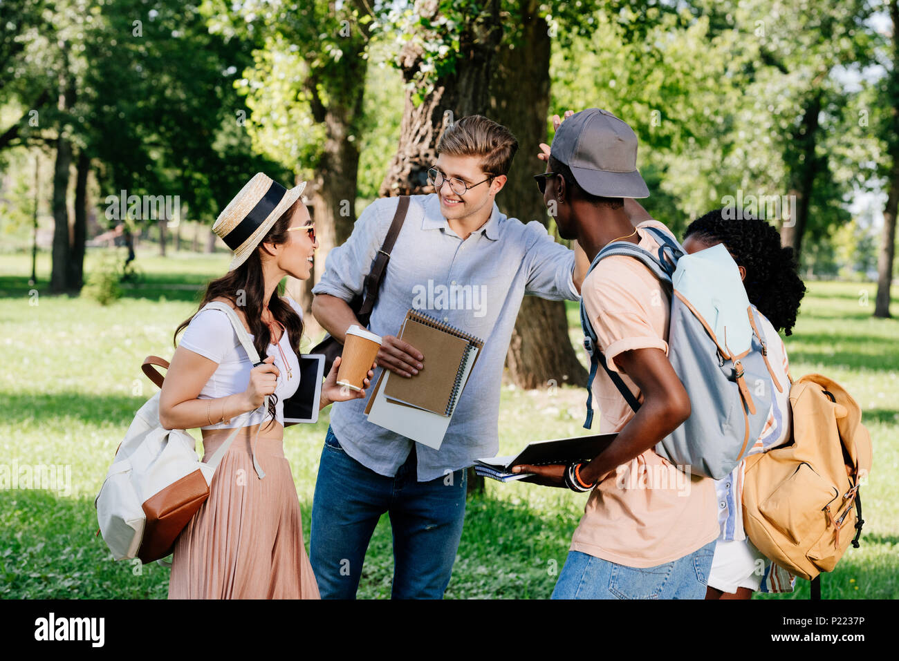 Group of students talking hi-res stock photography and images - Alamy