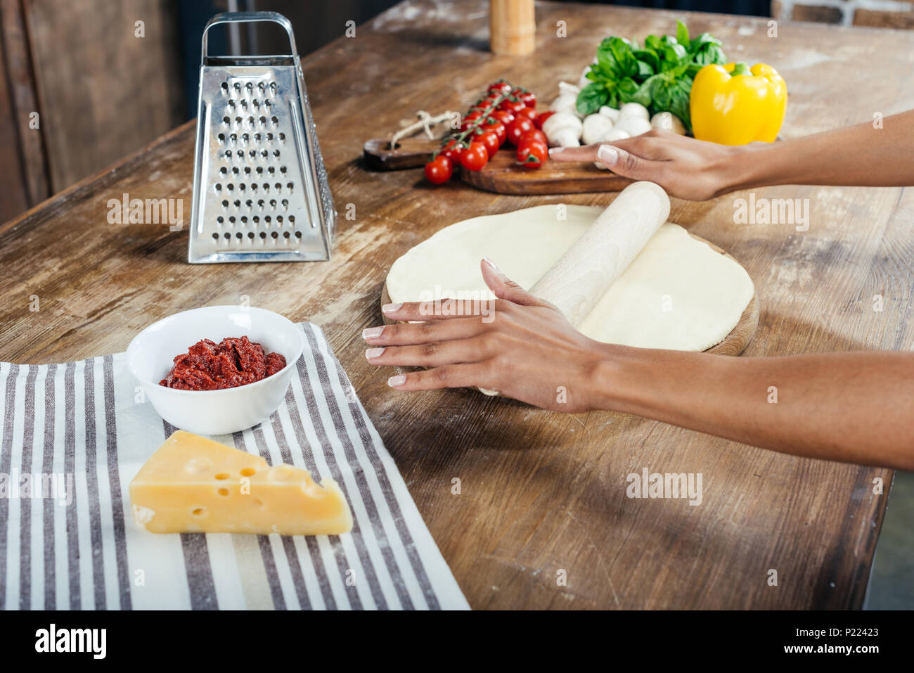 Person rolling dough hi-res stock photography and images - Alamy