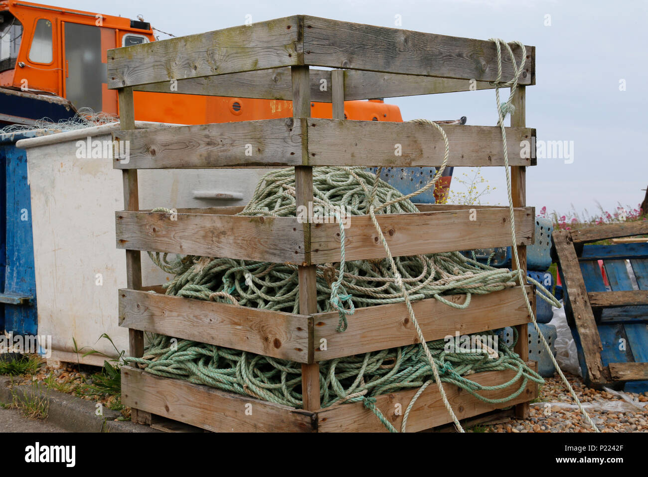 Old wooden crate full of fishing rope Stock Photo - Alamy