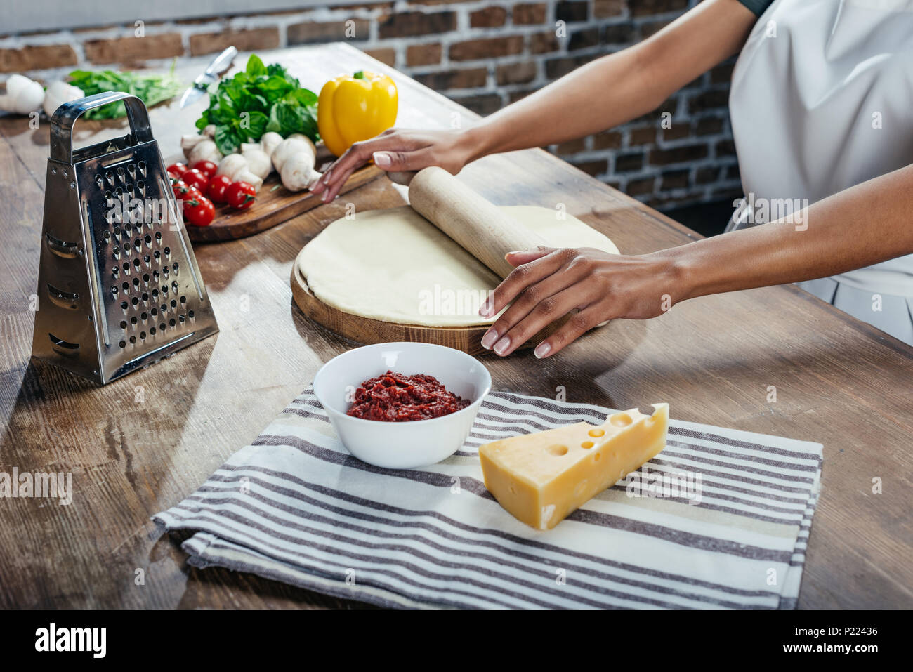 Person rolling dough hi-res stock photography and images - Alamy