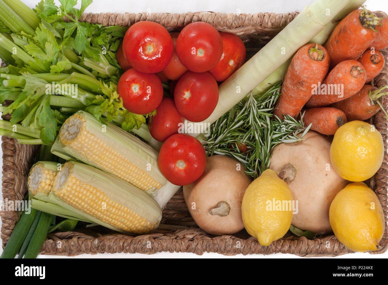 Basket of fresh vegetables Stock Photo - Alamy