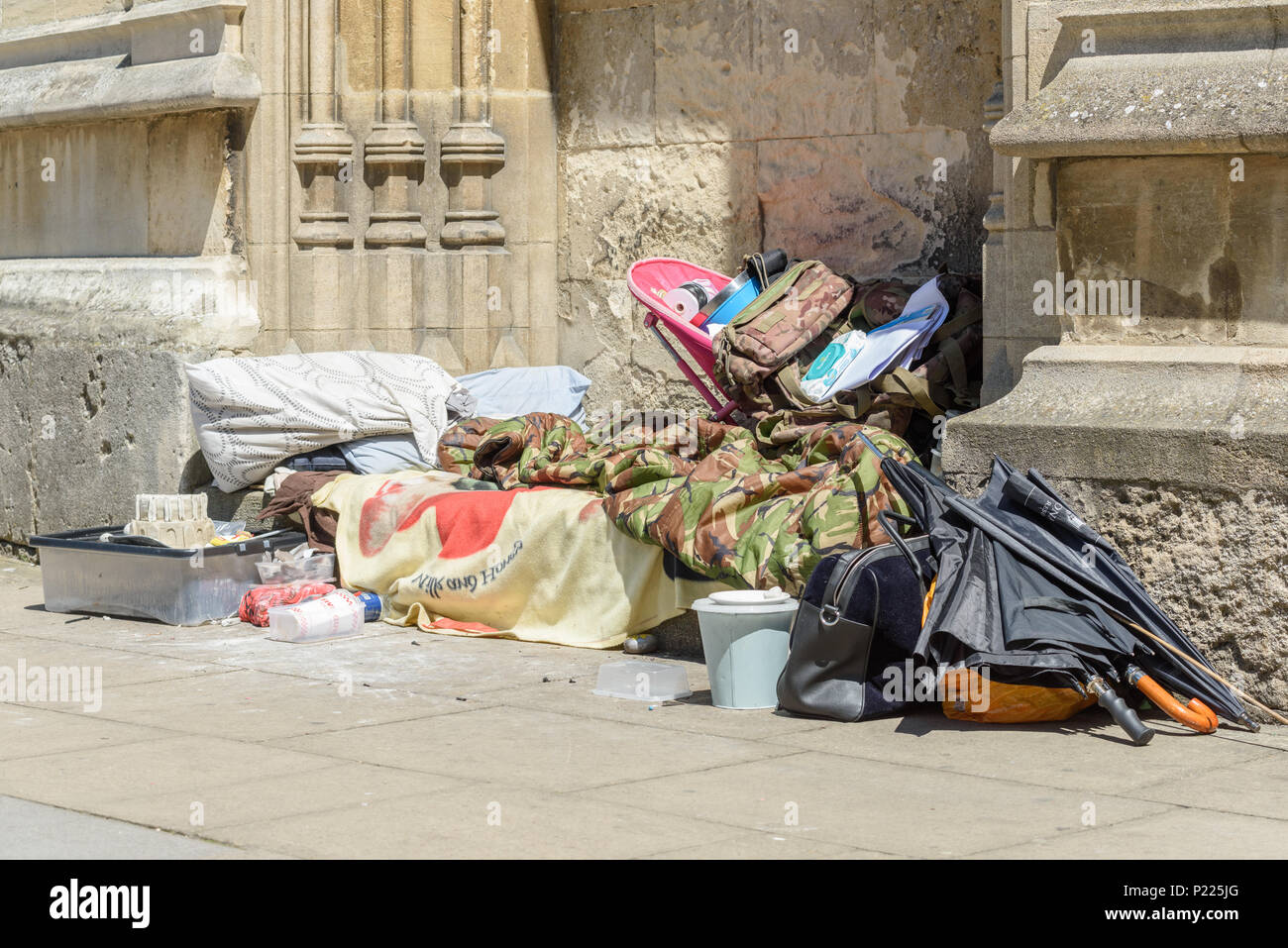 Vacant outdoors bed (of a down and out person) in the recess of an ...