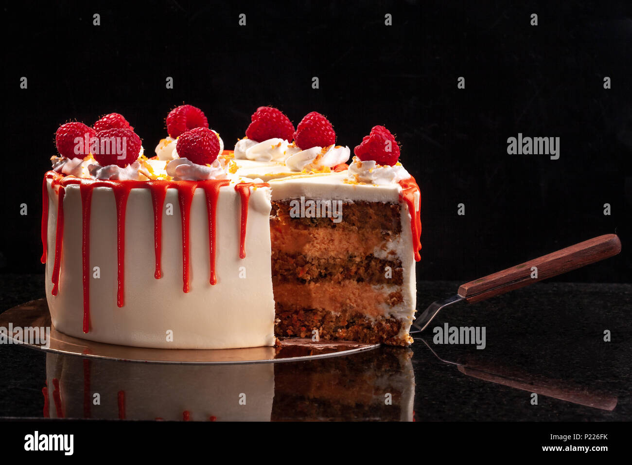 Raspberry cream mousse cake no baked cheesecake on black background ...