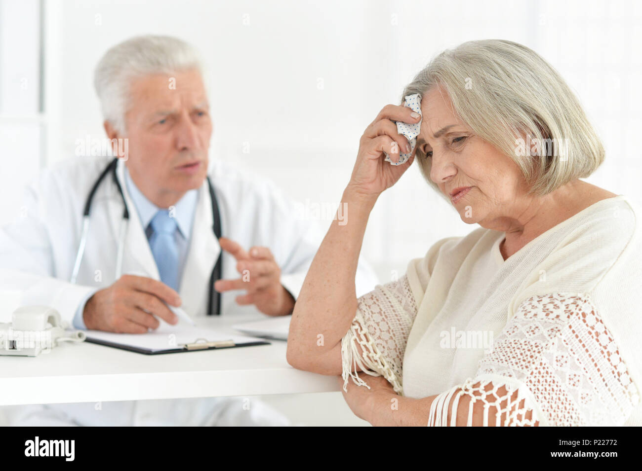 Senior doctor with a elderly patient Stock Photo - Alamy