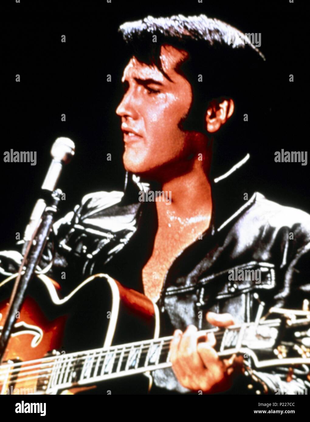 The American singer Elvis Presley during a concert in 1968 Stock Photo ...