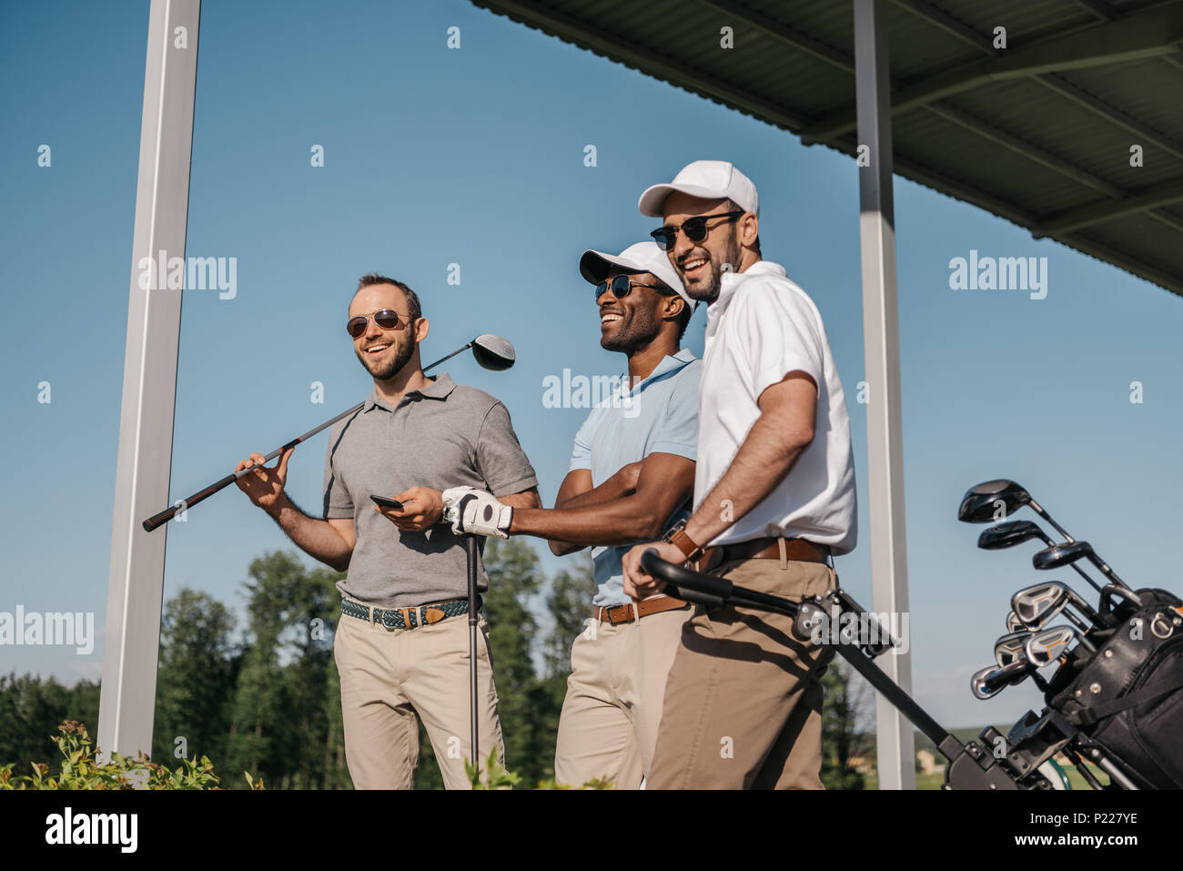 Golf course men three hi-res stock photography and images - Alamy
