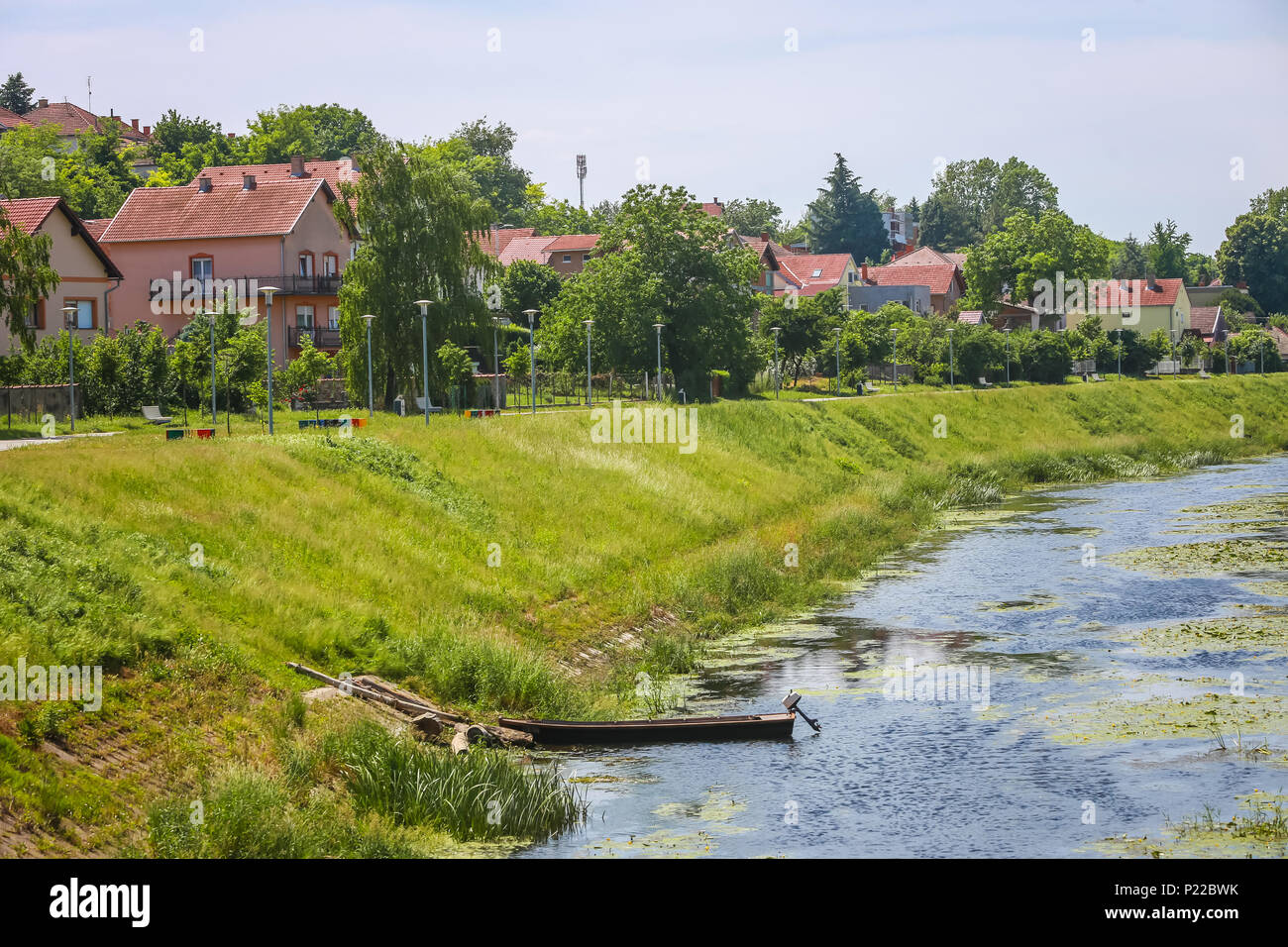 A view of the water channel of river Vuka with with motor boat in ...