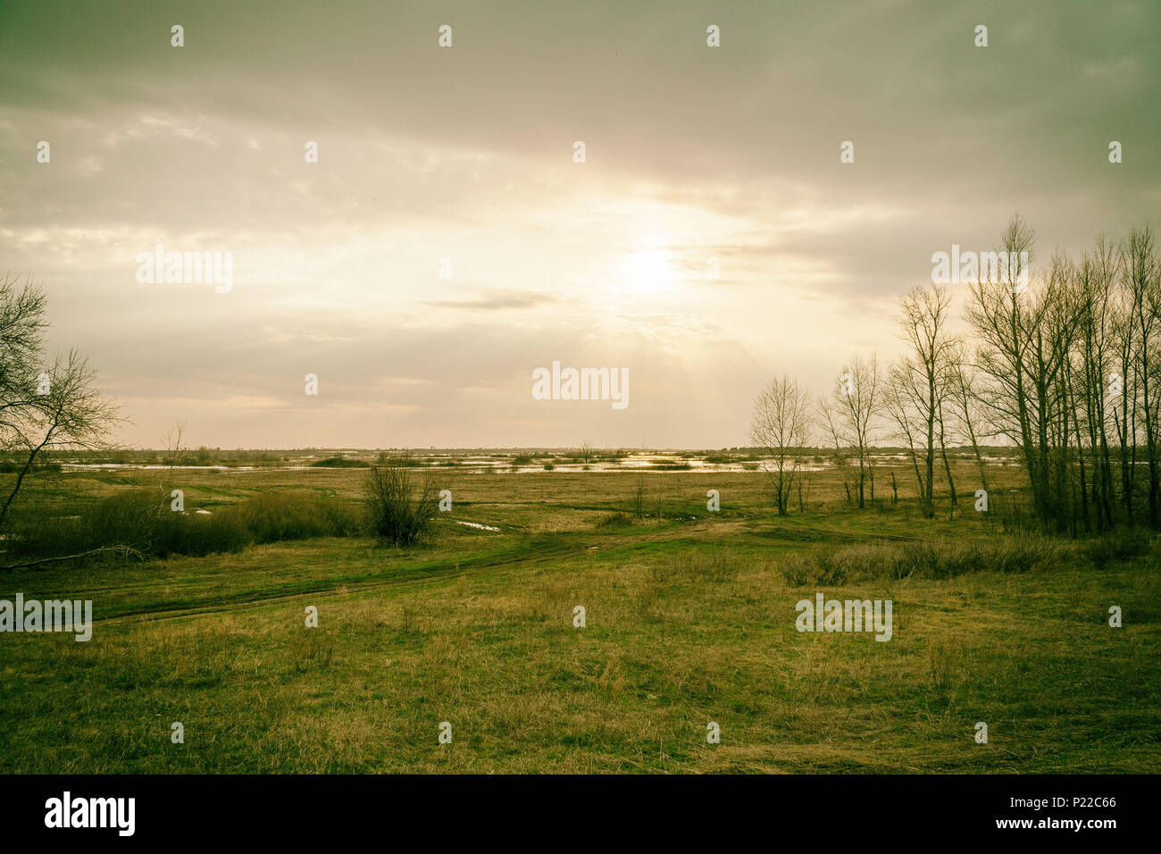 Sun shines through rain clouds hi-res stock photography and images - Alamy