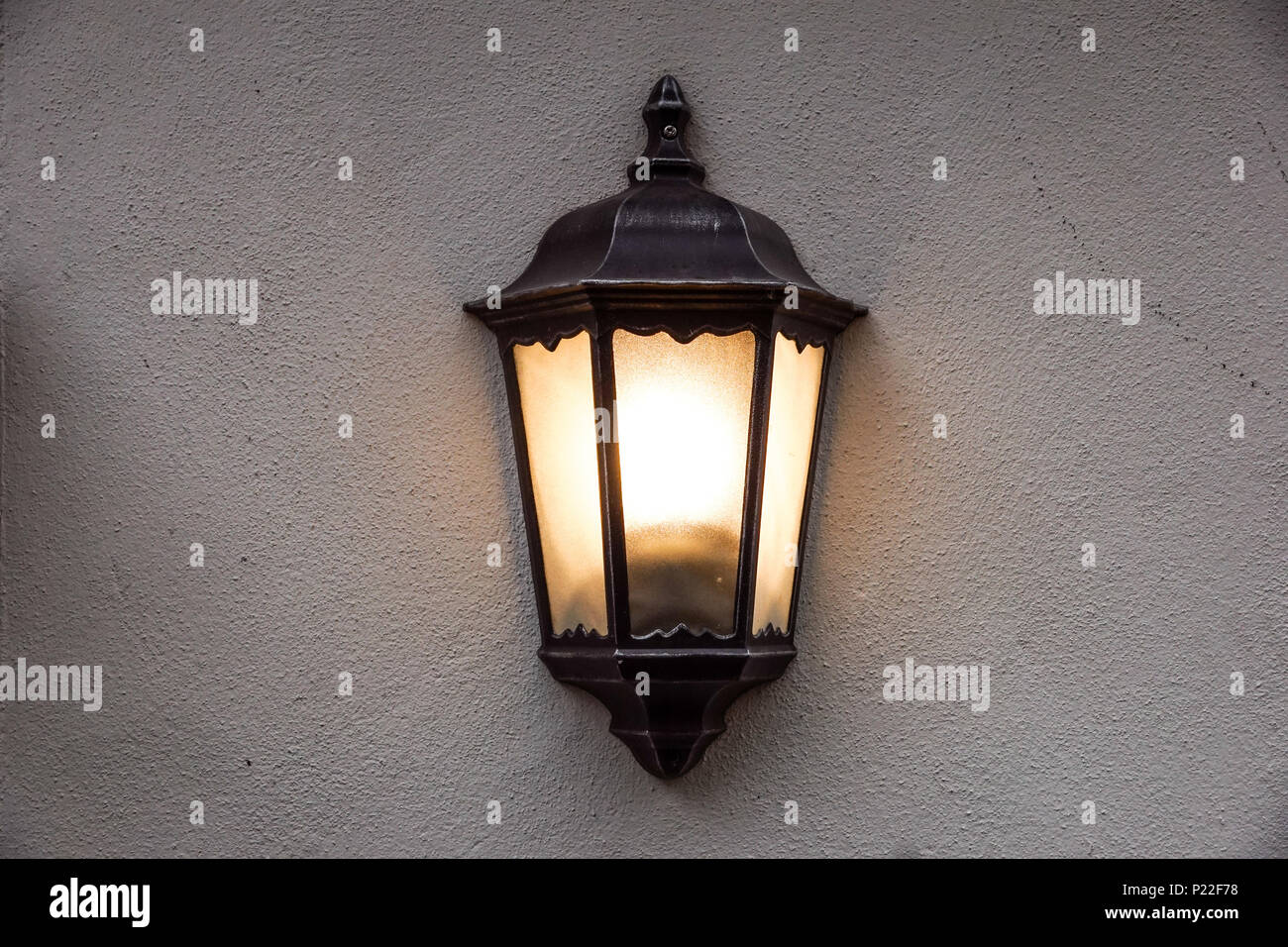 Lamp hanging on the wall Stock Photo - Alamy