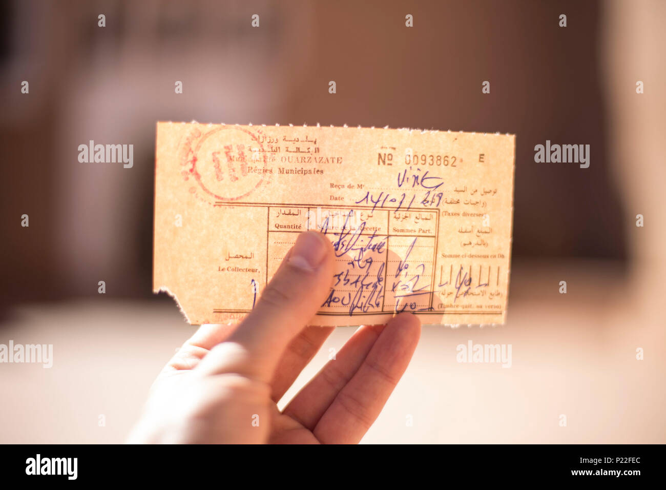 Morocco, Quarzazate, travel route along road N9, woman's hand holding a ...