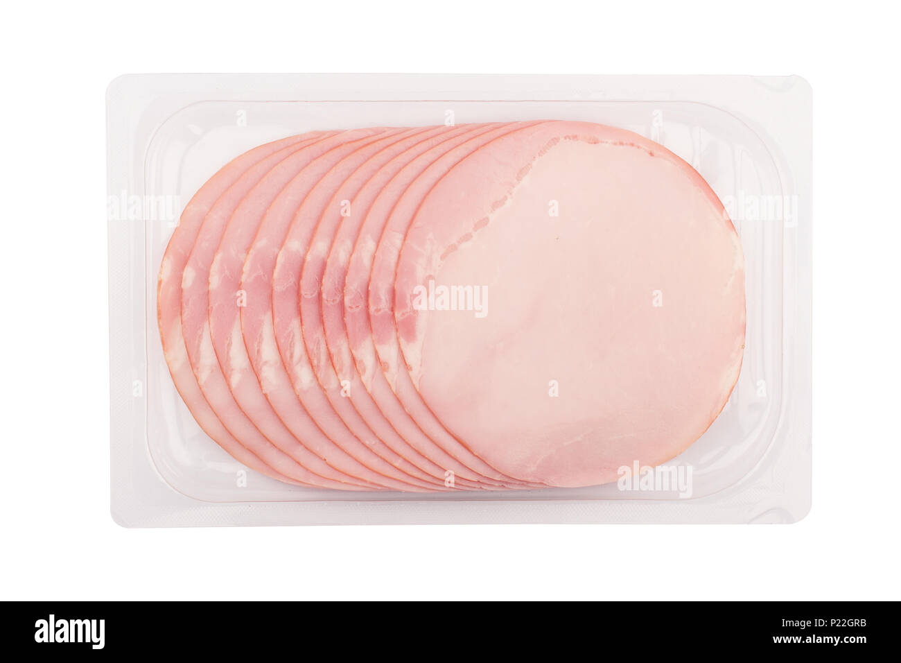 top view of round slices of smoked pork loin ham in transparent plastic ...