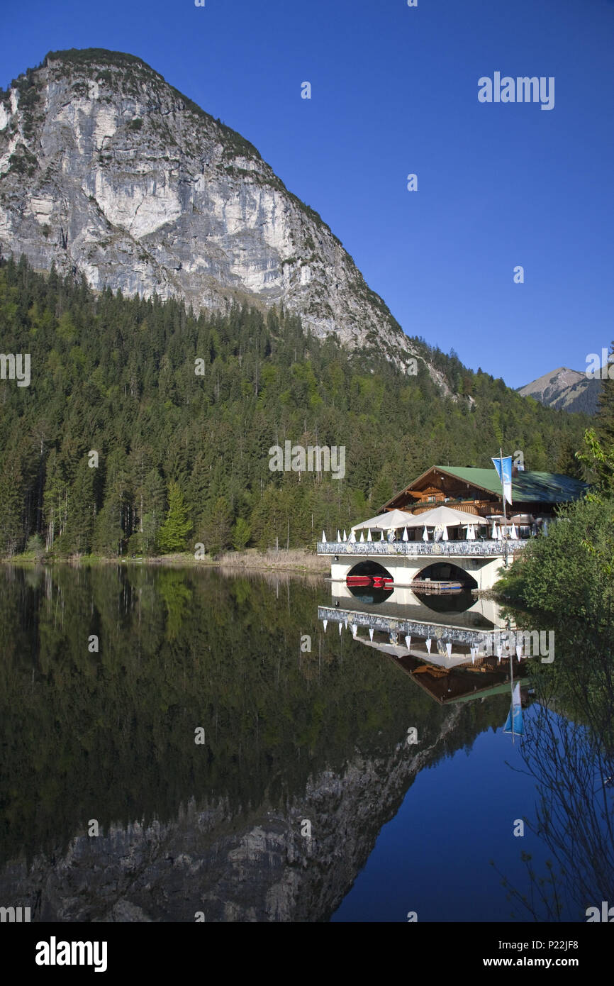 Mountain inn at the lake Pflegersee, Garmisch-Partenkirchen, Bavaria ...