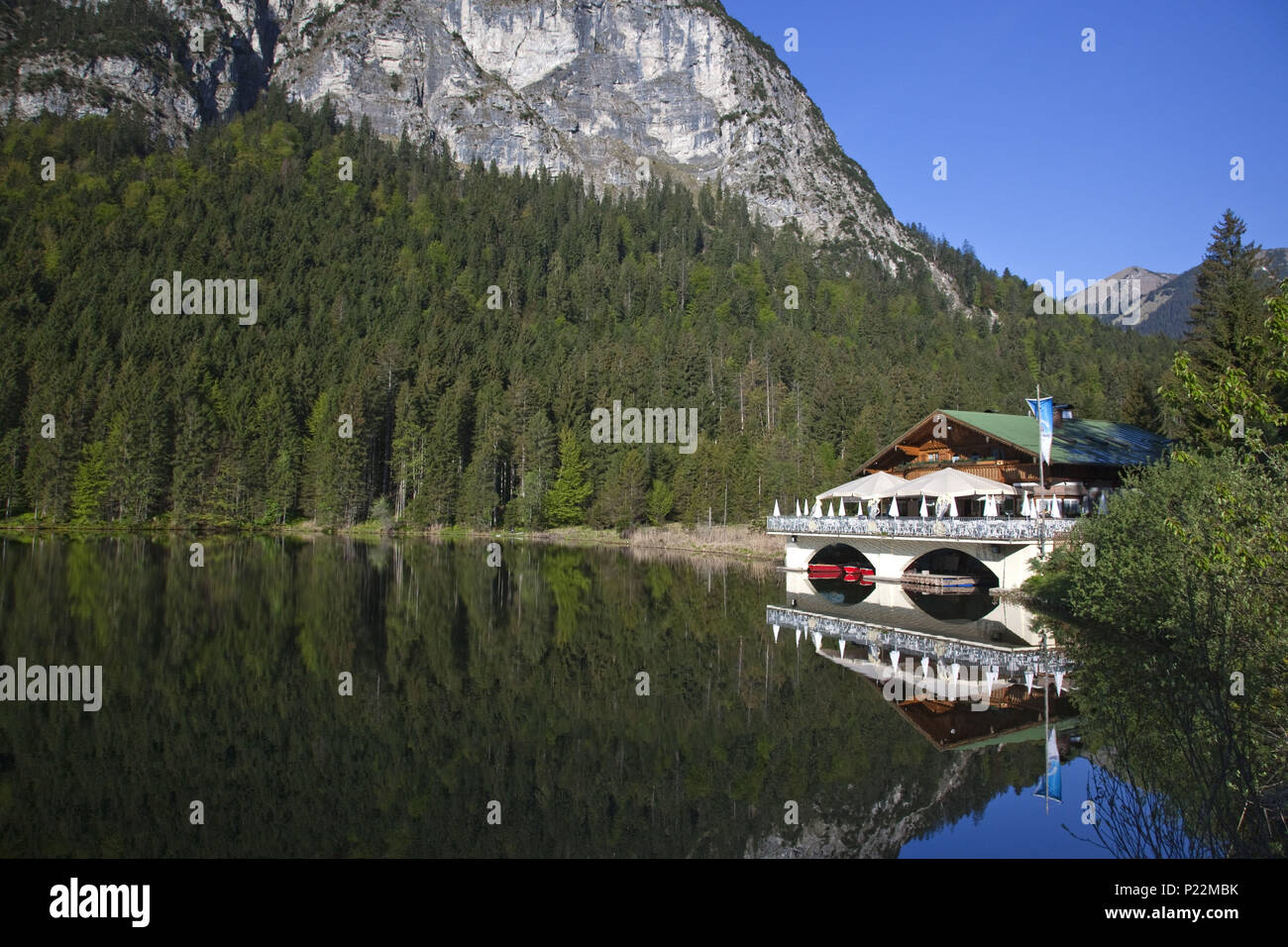Mountain inn at lake Pflegersee, Garmisch-Partenkirchen, Bavaria ...