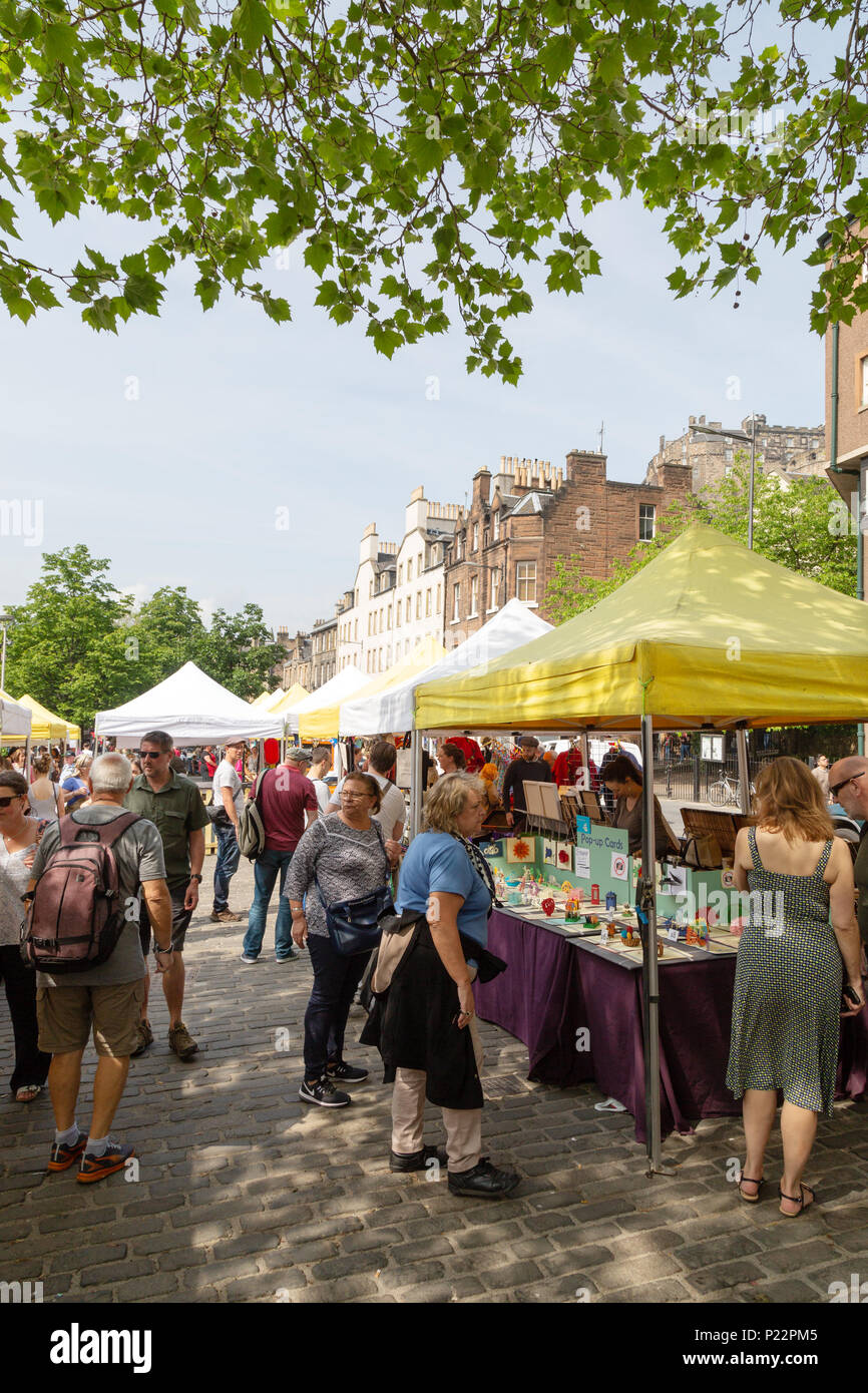 People shopping in the weekly market, Grassmarket, Edinburgh Old Town ...