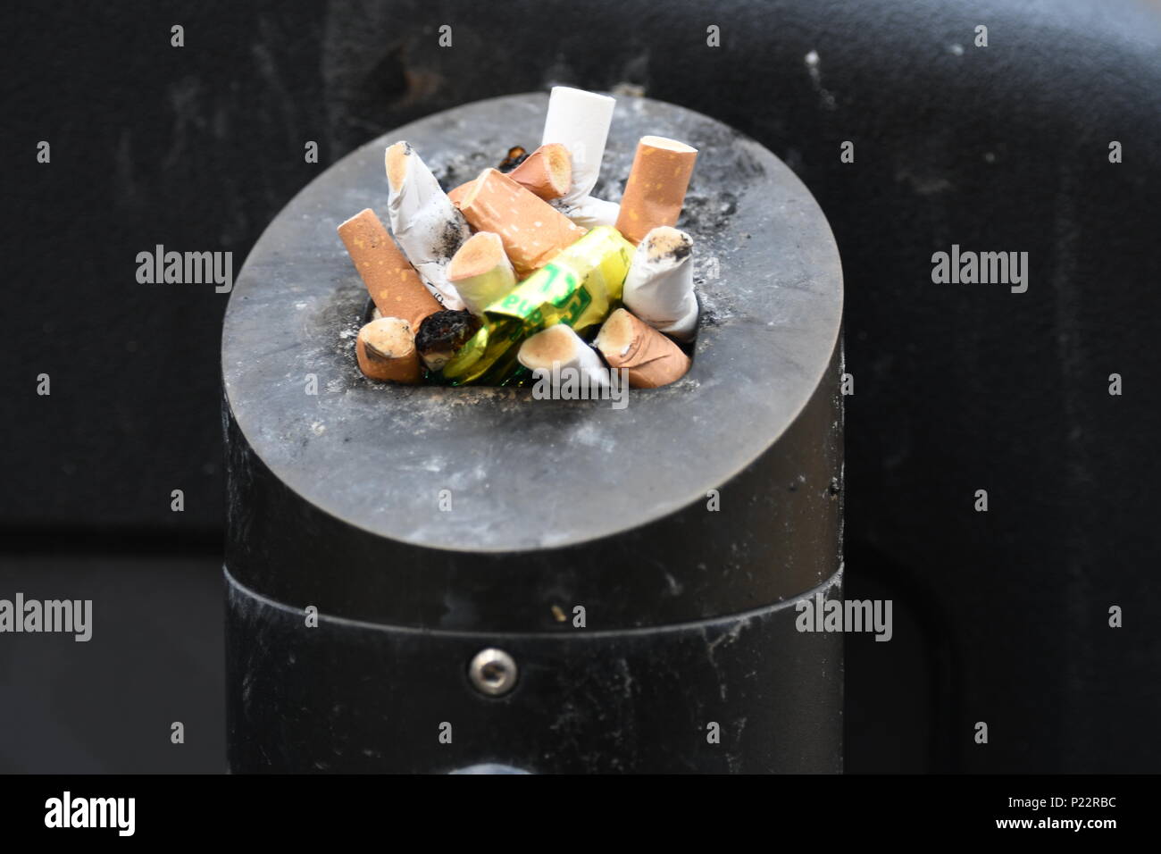 Overflowing full ashtray hi-res stock photography and images - Alamy