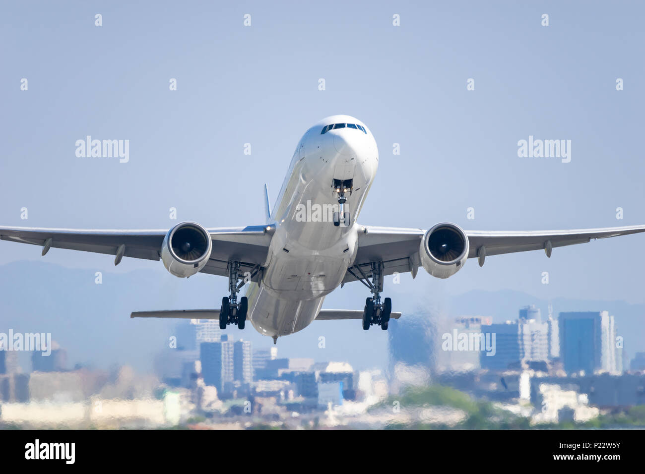 Boeing 777-300 taking off from the airport Stock Photo - Alamy