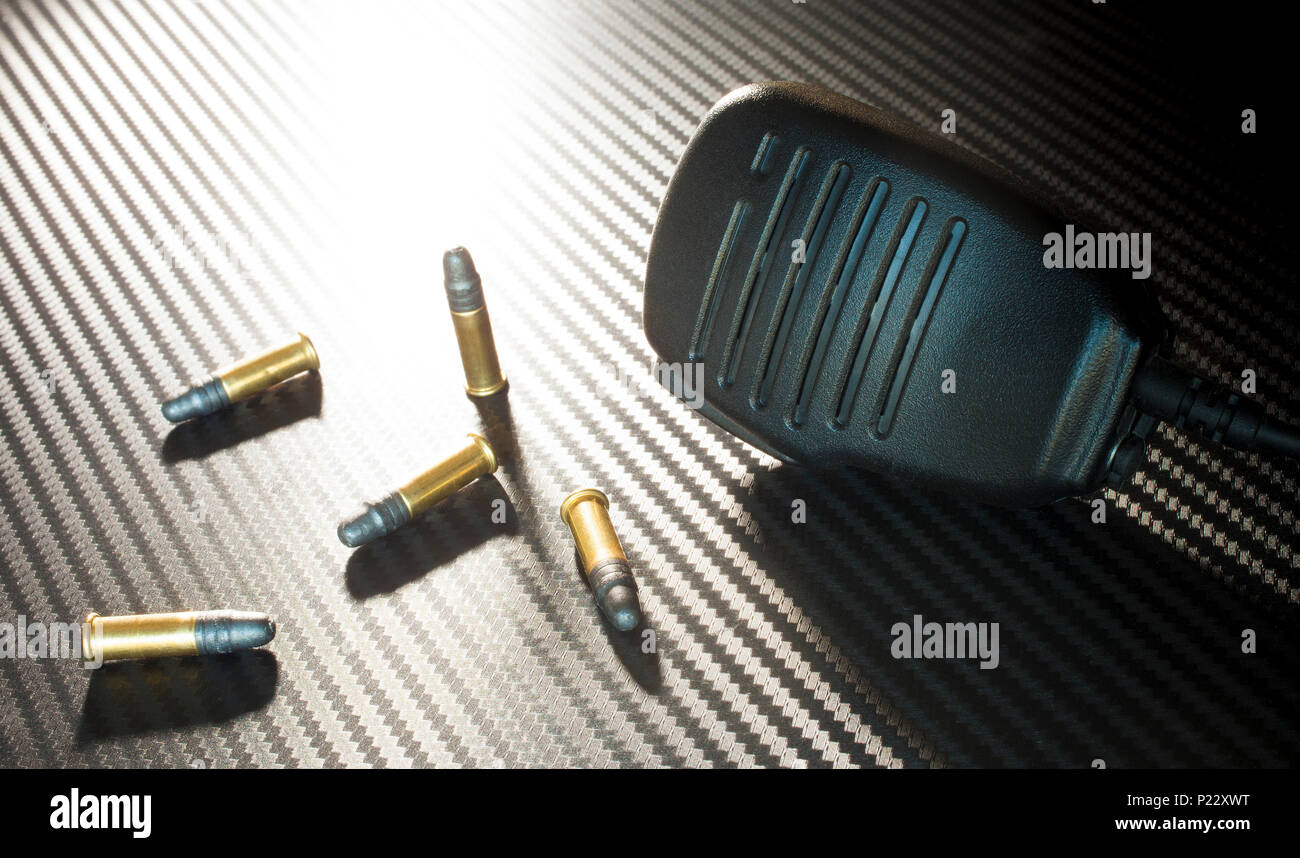 Police radio microphone with rim fire cartridges Stock Photo - Alamy