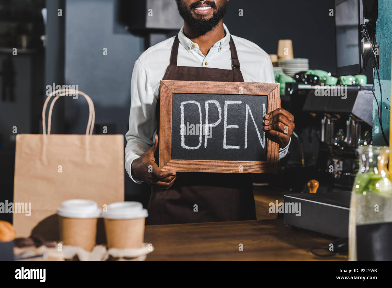 Person opening bag of coffee hi-res stock photography and images - Alamy