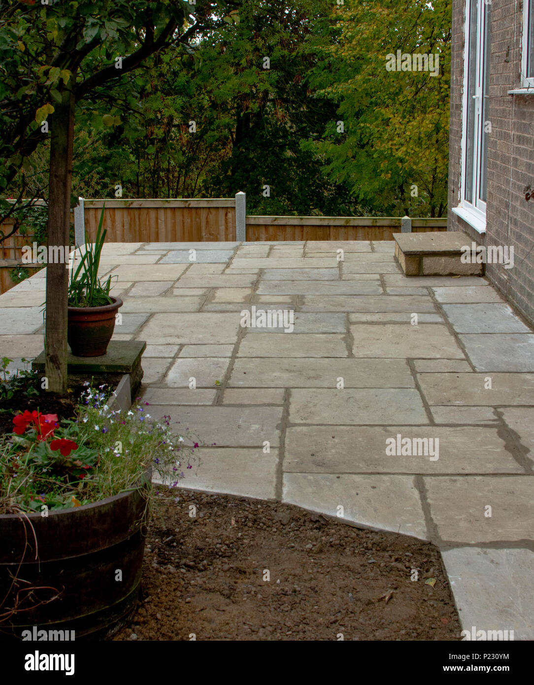 Newly laid patio made from indian slate Stock Photo - Alamy