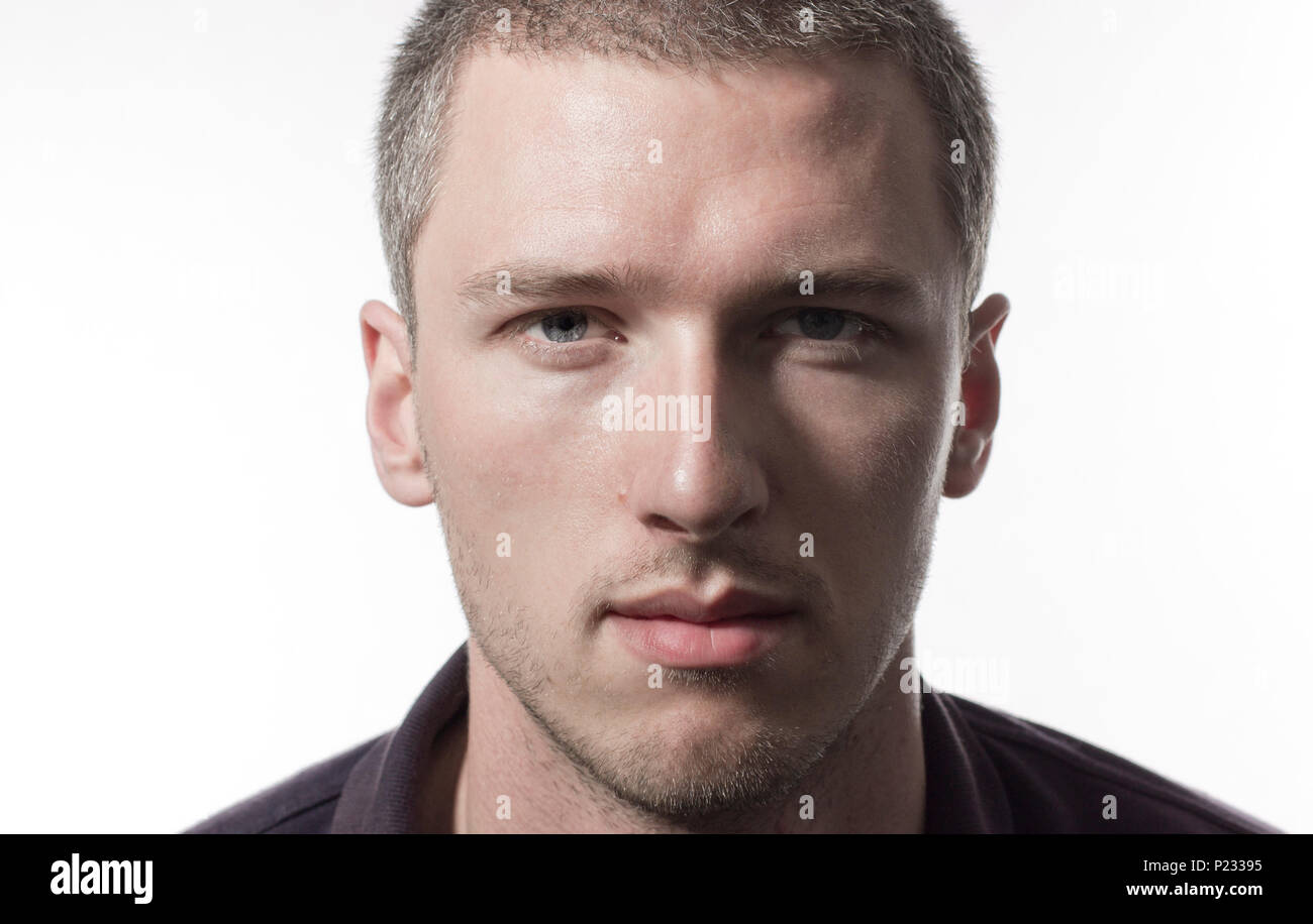 Headshot portrait of a young handsome man isolated on white background ...