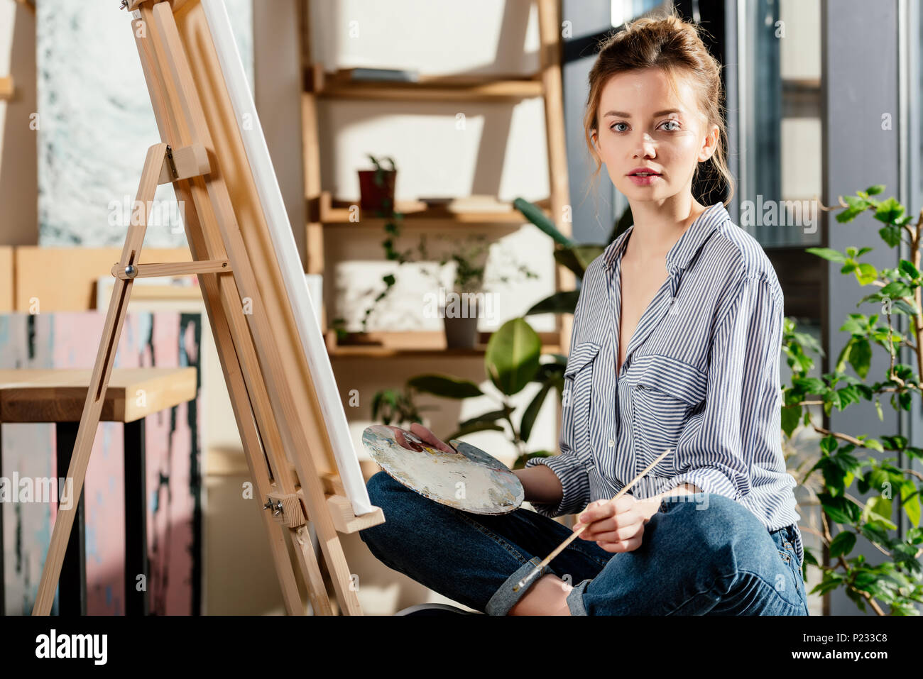 Painting woman sitting on bench hi-res stock photography and images - Alamy