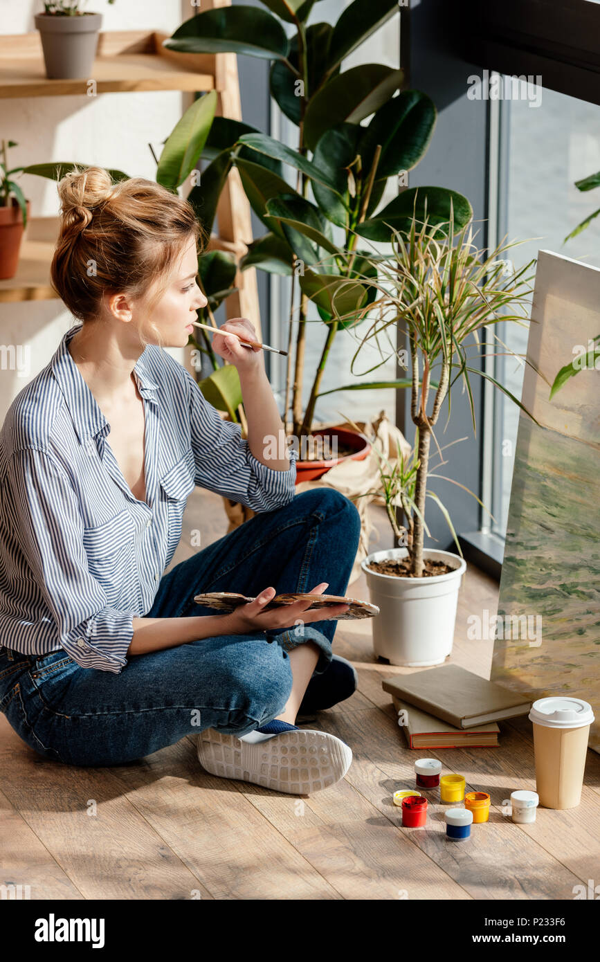 Side profile young woman painting hi-res stock photography and images ...
